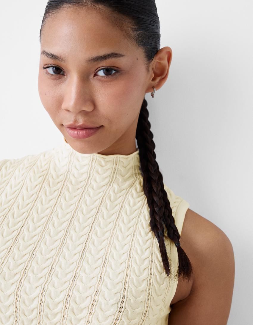 Sleeveless cable-knit top with high neck - BSK Teen | Bershka