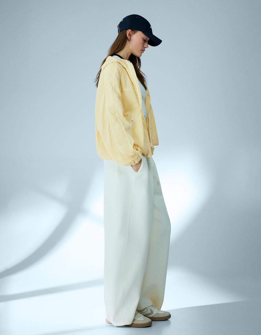 Technical hooded jacket - Women | Bershka