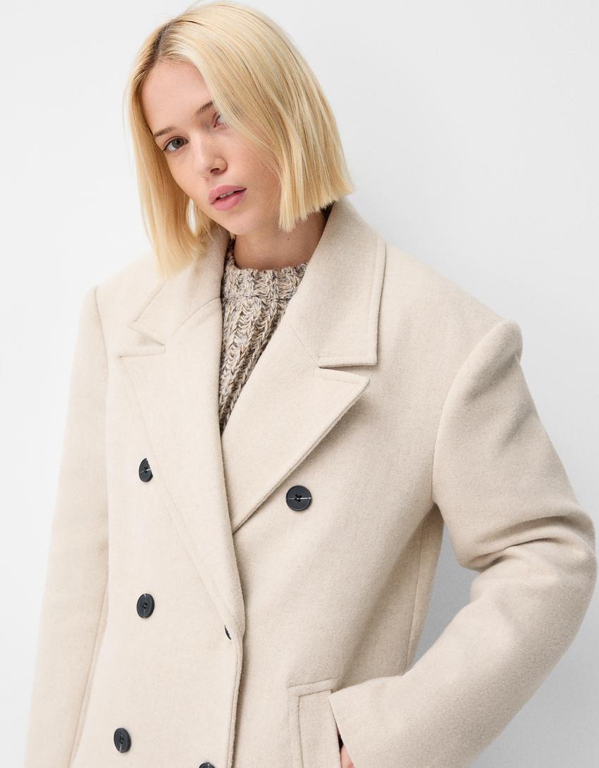 Predimenzionirani kaput od debele tkanine - Žene | Bershka