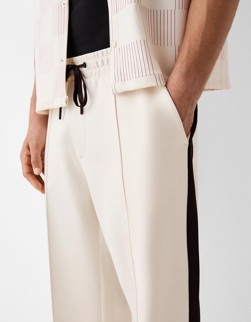 Interlock trousers with side stripes - Men | Bershka