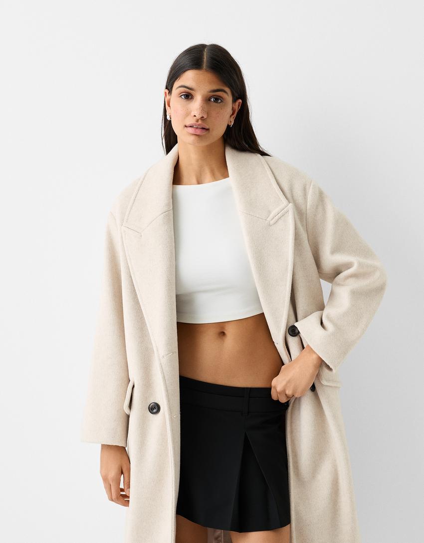Drop-shoulder long coat - Women | Bershka
